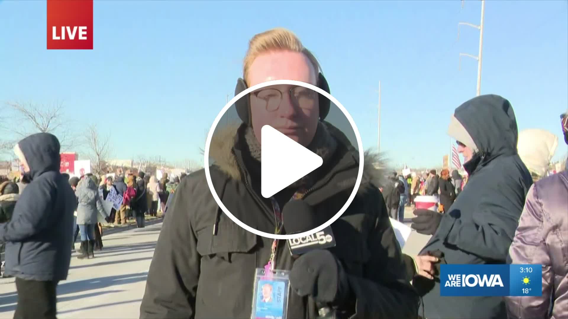 Protestors greet Trump in Iowa with anti-ICE messages afer Minnesota ...