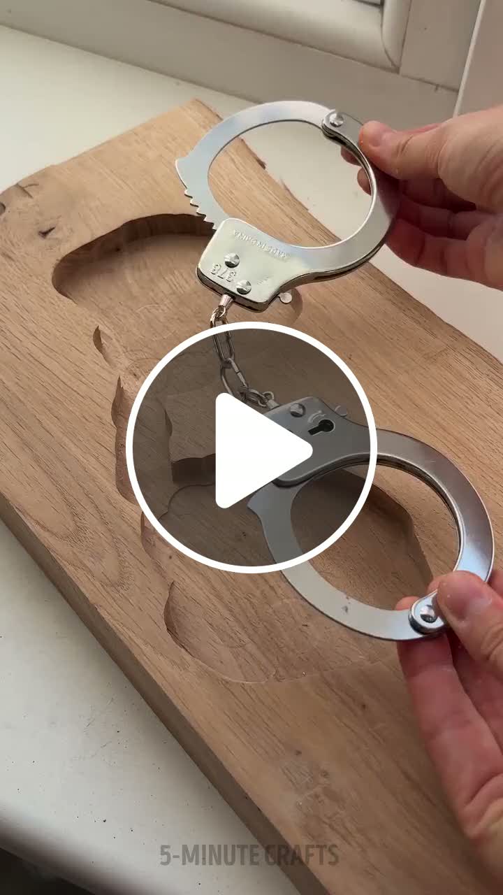 Epoxy-Poured Handcuff Art - NewsBreak