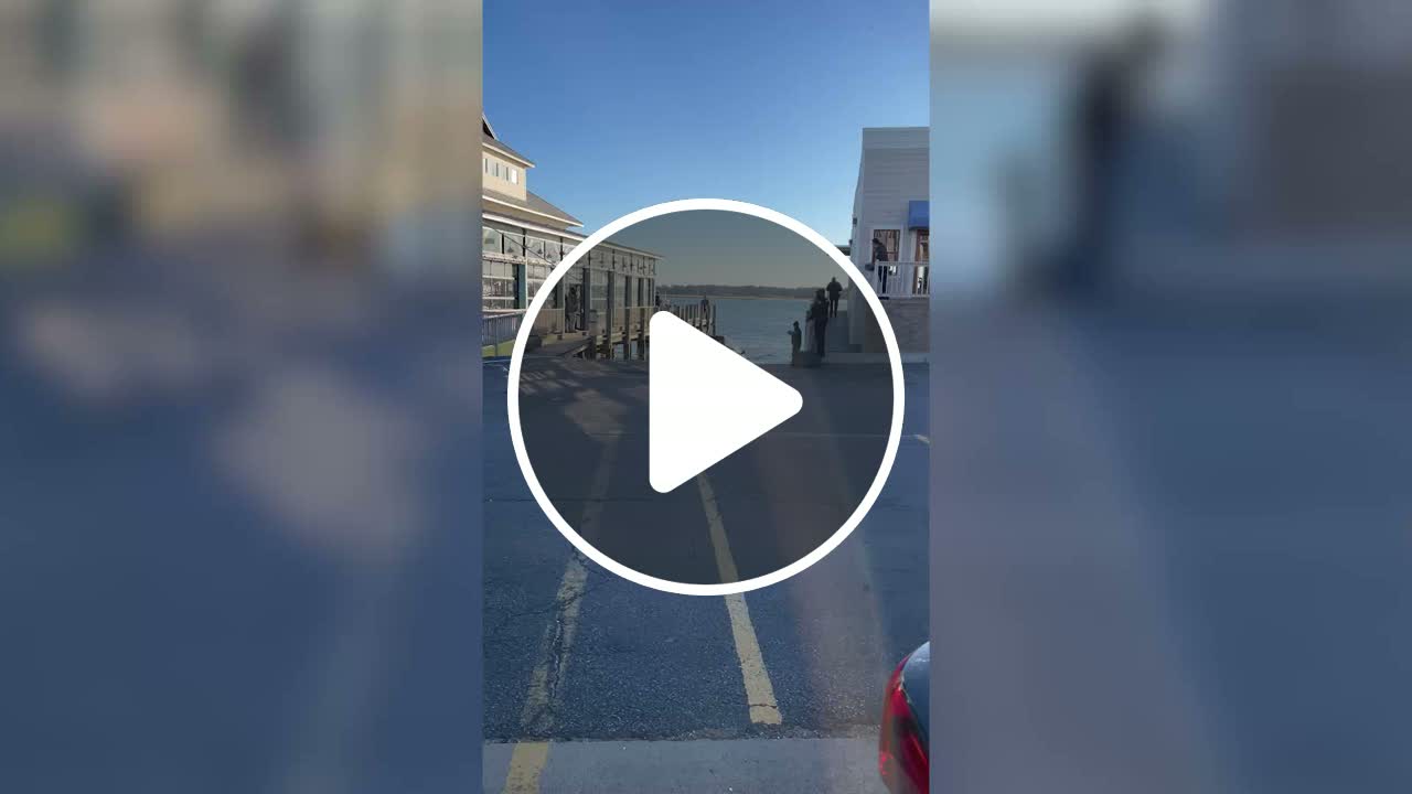 Car towed out of the water at The Back Deck - NewsBreak