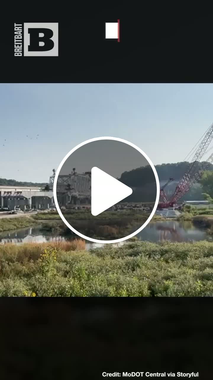 A historic bridge truss over the Missouri River was demolished Sunday ...