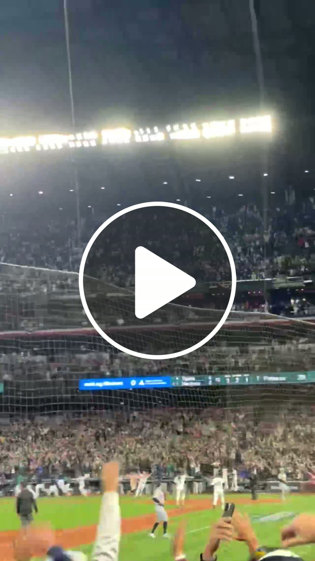 Mariners fans celebrate their win in Game 5 of the ALDS - NewsBreak
