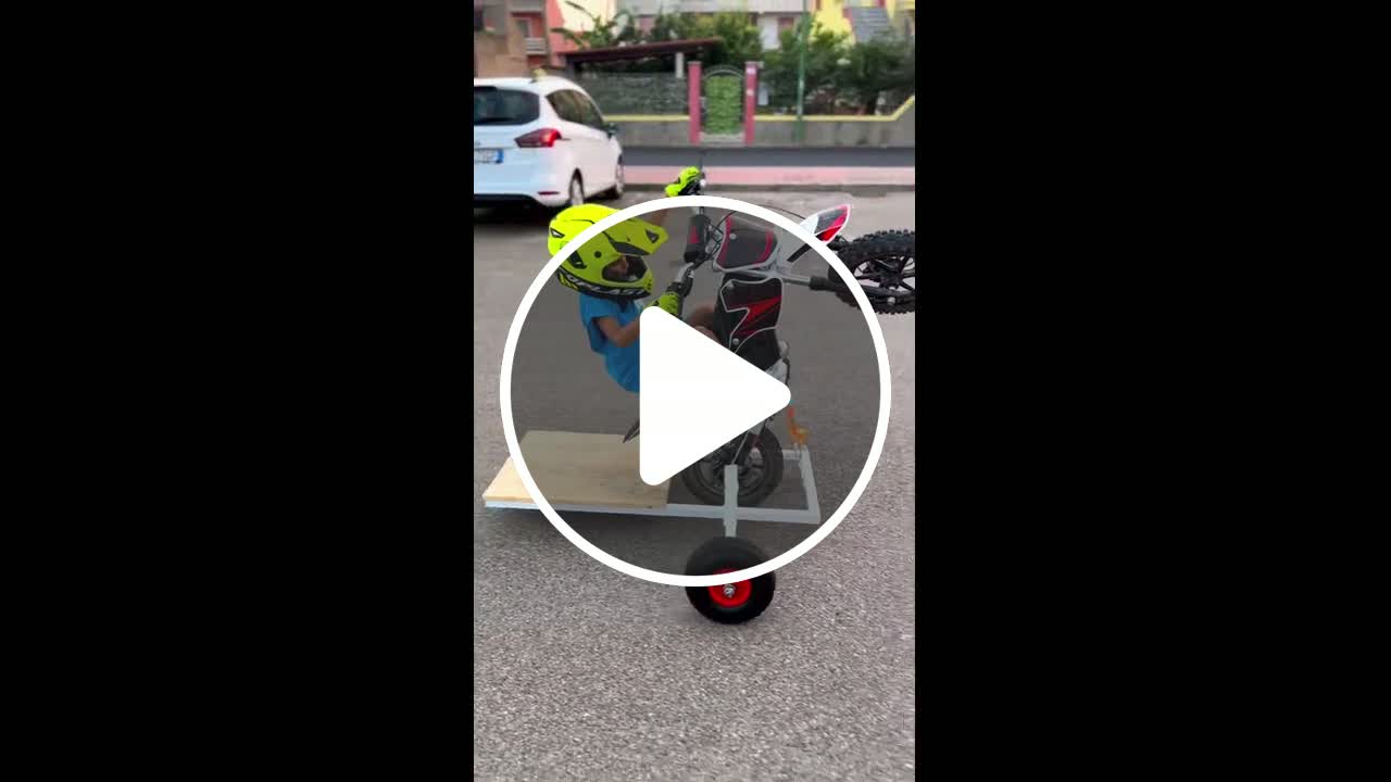 Child performs first supported wheelie on dirt bike in Sardegna, Italy ...