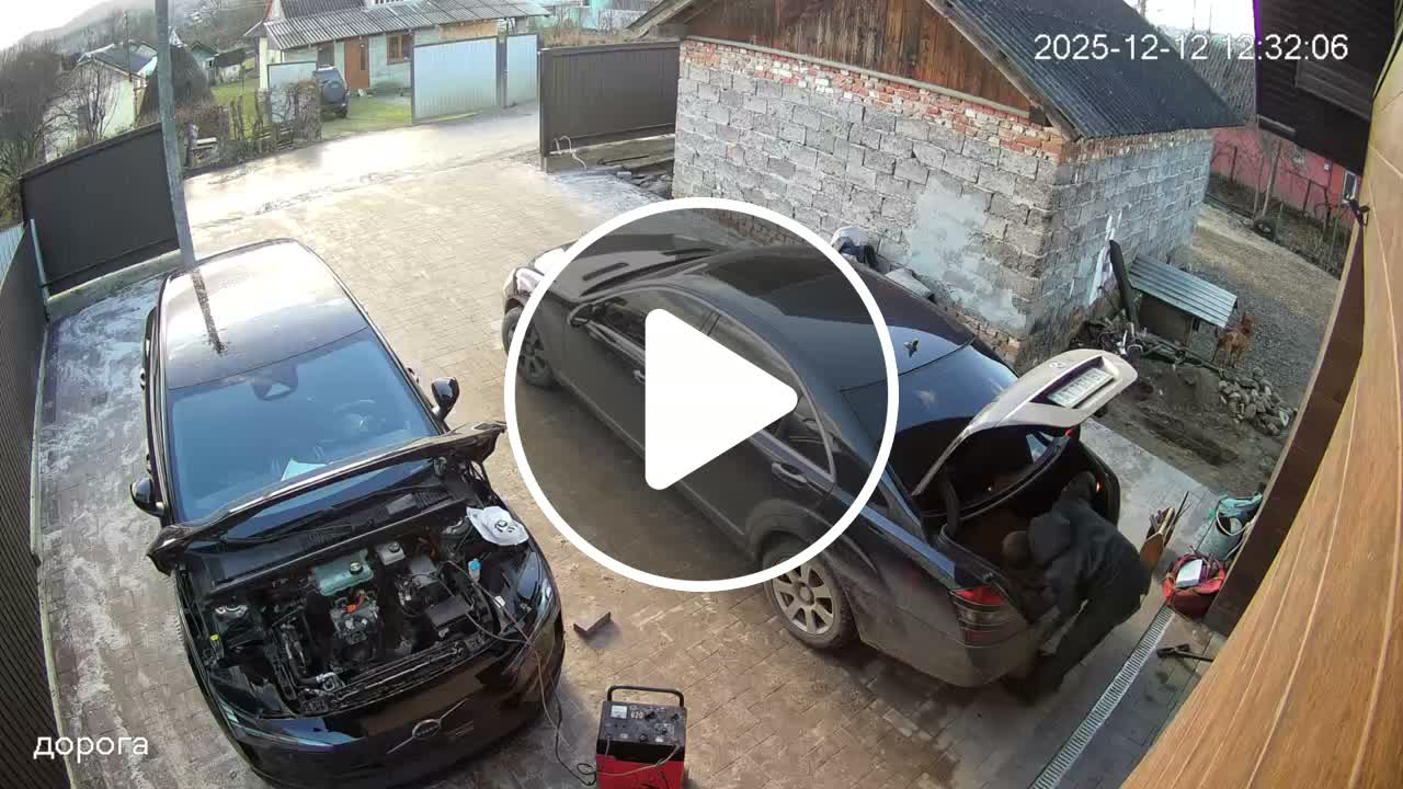 Car headlight explodes and falls on worker busy with garage repair ...