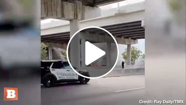 Footage captured on Friday shows firefighters battling smoke and fire ...