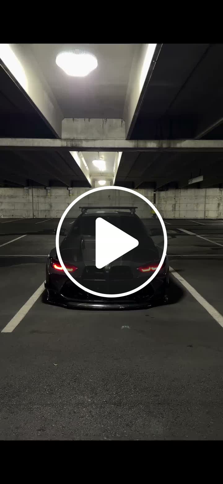 That is an incredibly sleek BMW M4 (G82). The carbon fiber work and ...