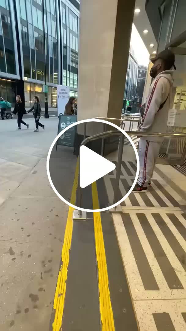 Guy runs a lint roller over random strangers as they walk by. - NewsBreak