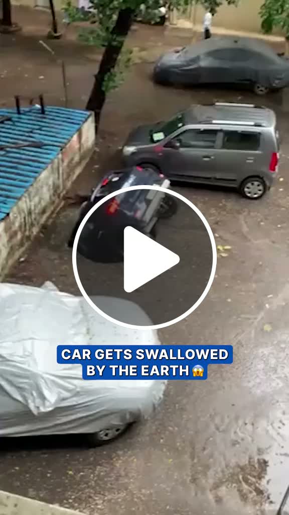 A car was swallowed up by a sinkhole in India after a concrete parking ...