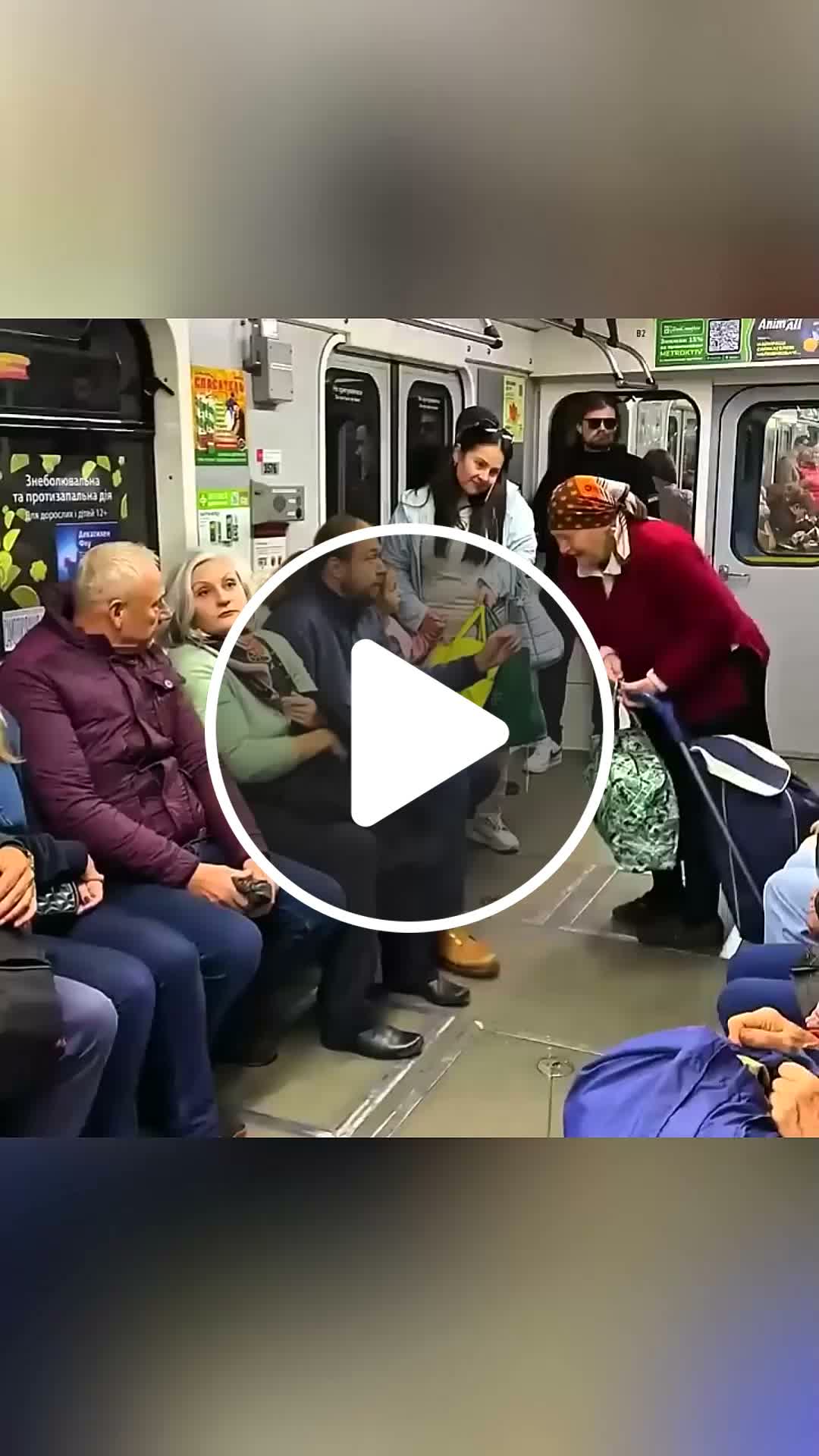 An old woman boards bus while people are getting off A man offers her ...