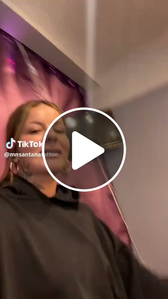 Cardi B getting a neck and lower back dermal piercing yesterday in NYC ...