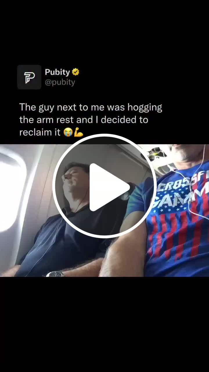 The guy next to me was hogging the arm rest and I decided to reclaim it ...
