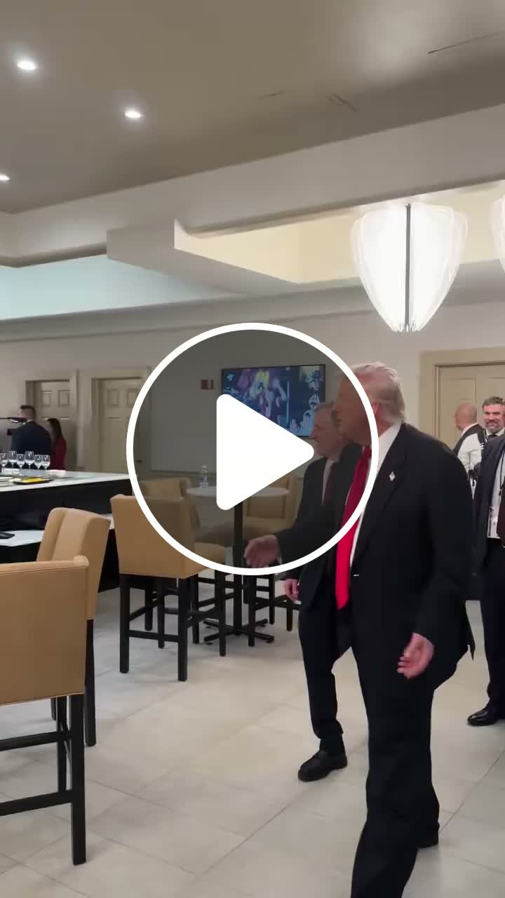 Trump calls over a boy at the Lion's vs. Commanders game and give him a ...