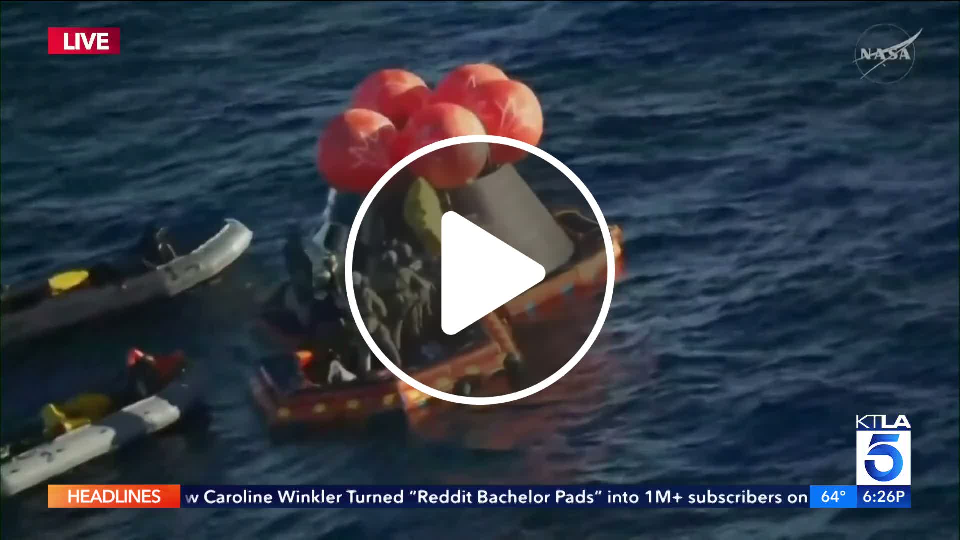 Recovery team opens Artemis II hatch as astronauts splash down off San ...