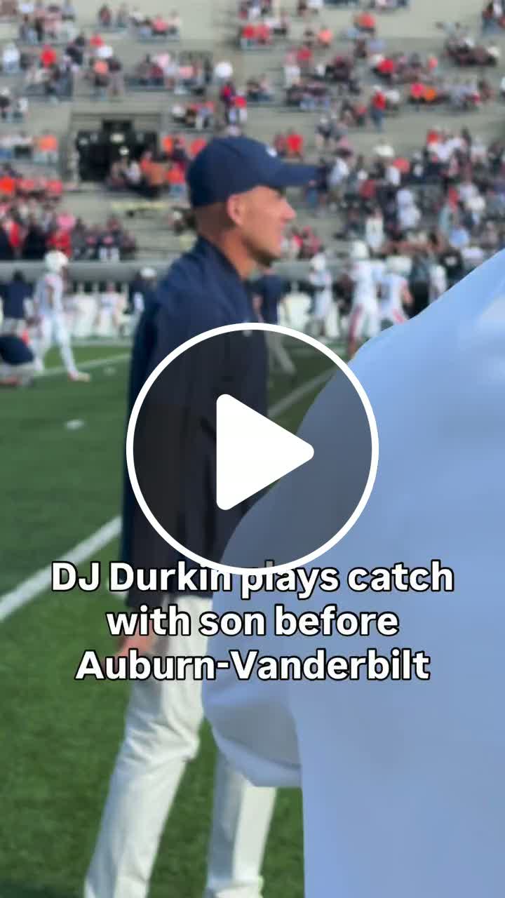 Auburn interim head coach DJ Durkin is all smiles while he plays catch ...