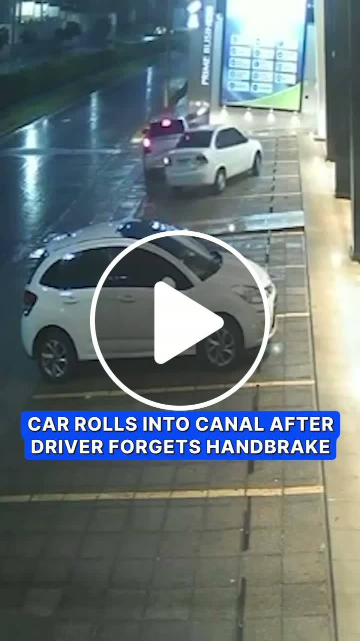 Car rolls into canal after driver forgets handbrake - NewsBreak