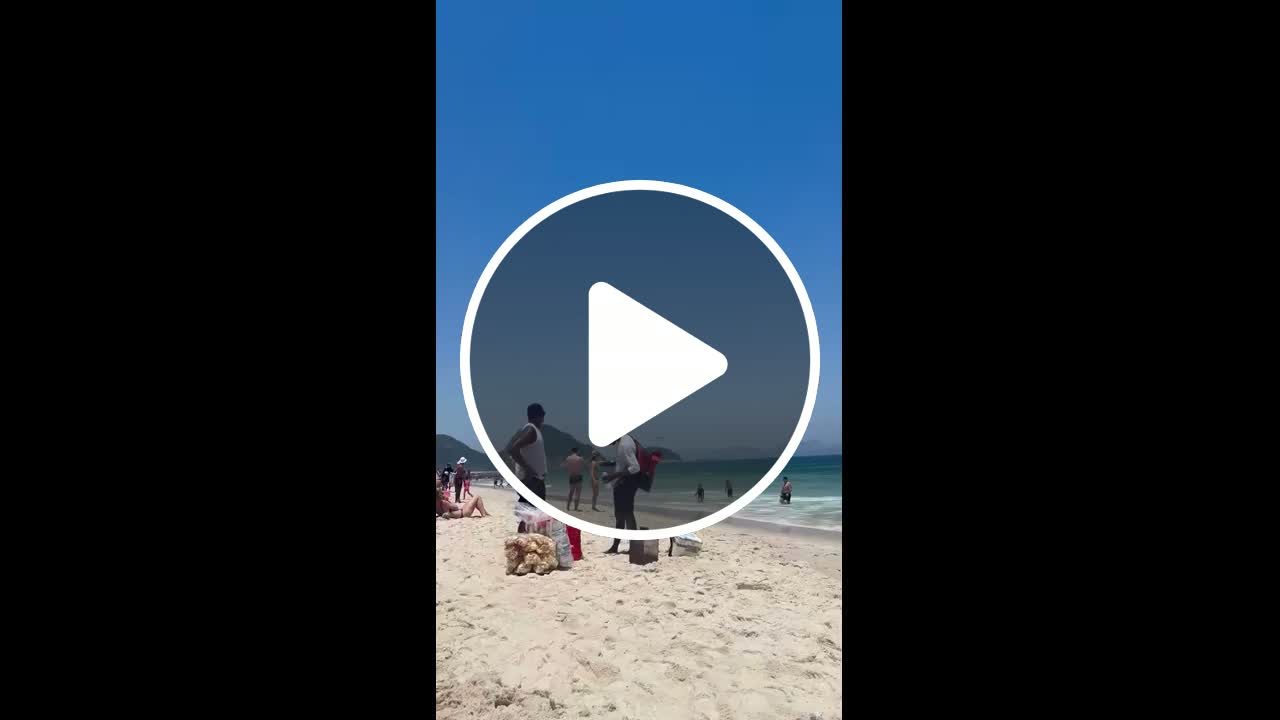 Emergency helicopter hovers over Copacabana Beach after plane crash ...