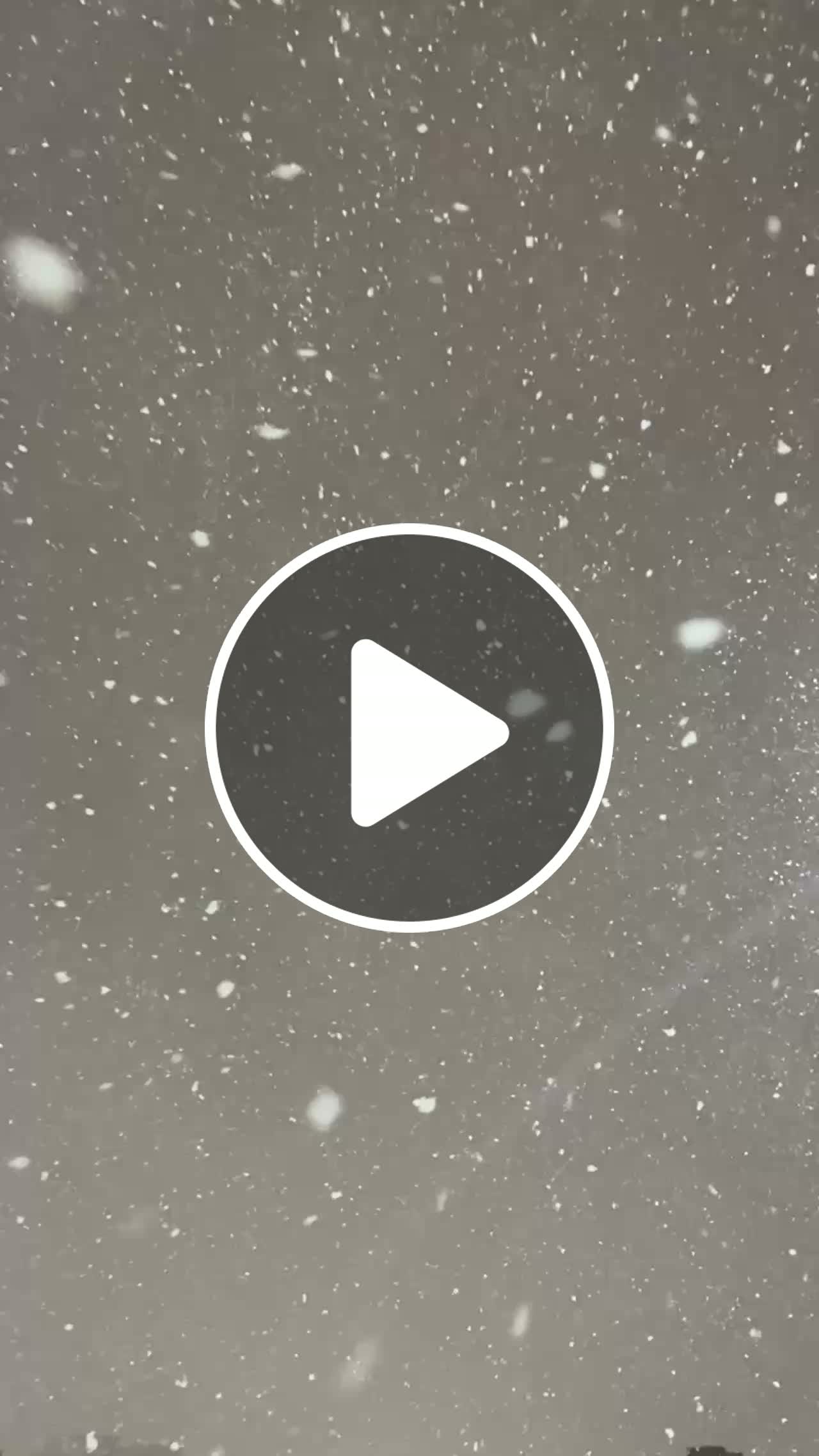 Snow squall in slow motion blowing through downtown Buffalo - NewsBreak