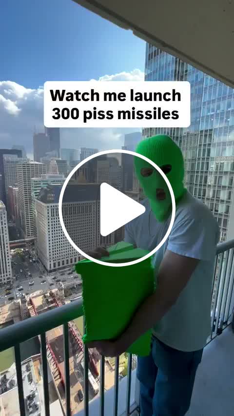 Masked man throws 300 paper airplanes off a building in Chicago - NewsBreak