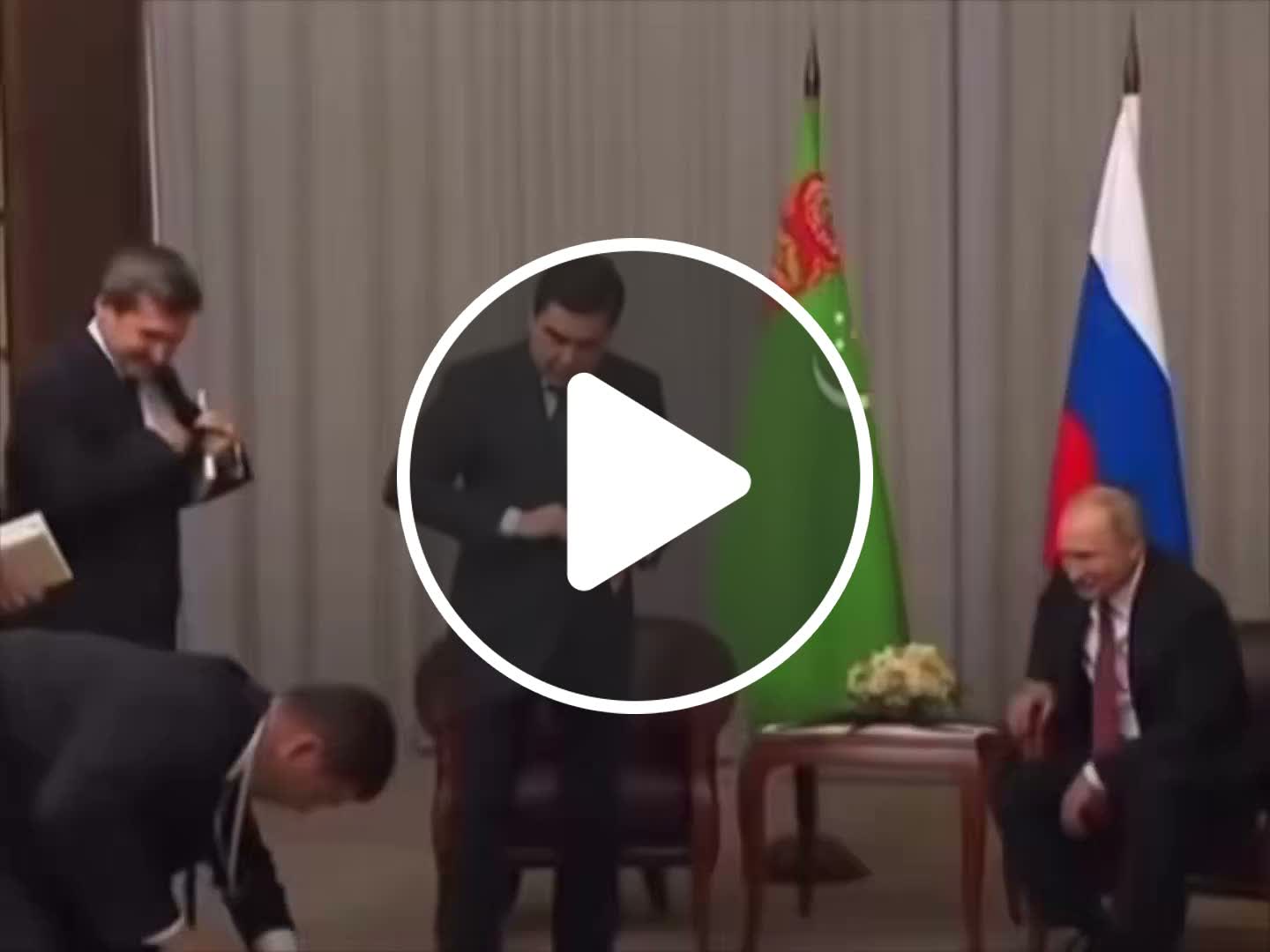 President Putin sees him holding the dog by her scruff and does ...