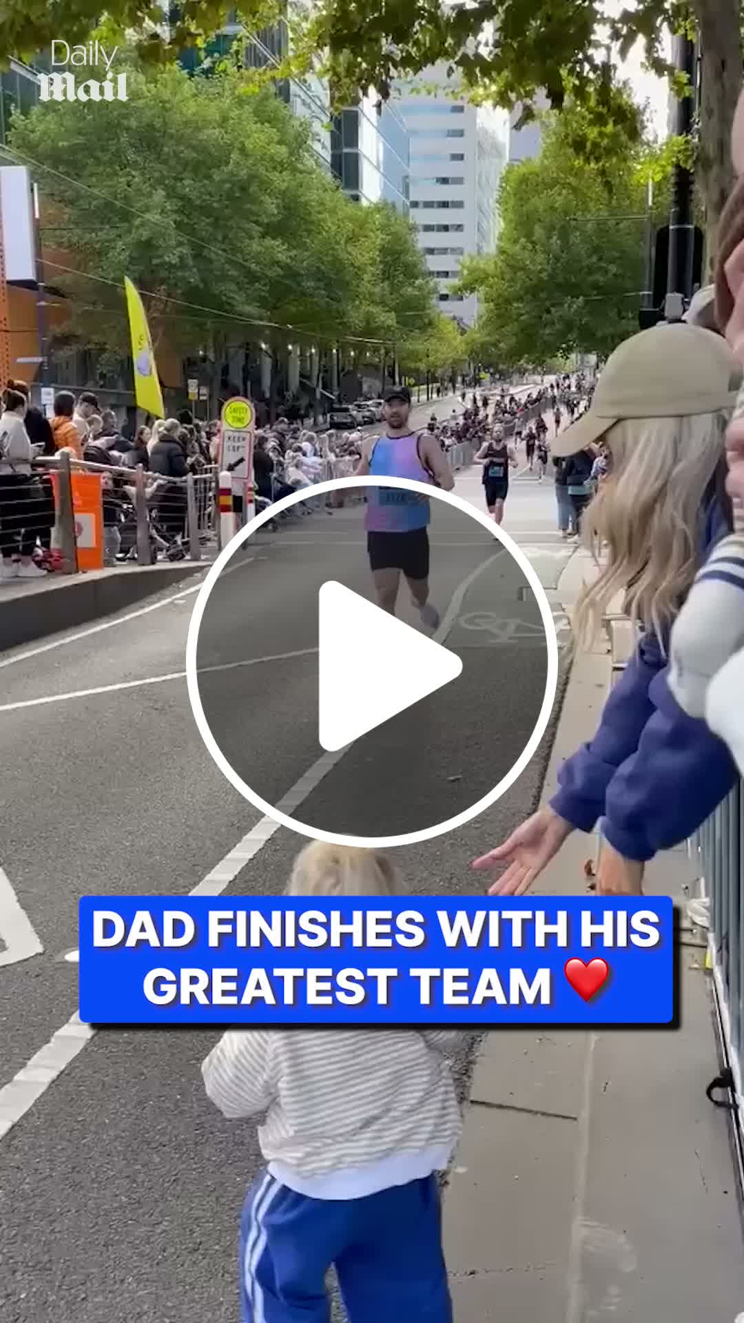 Father carries sons across the finish line - NewsBreak