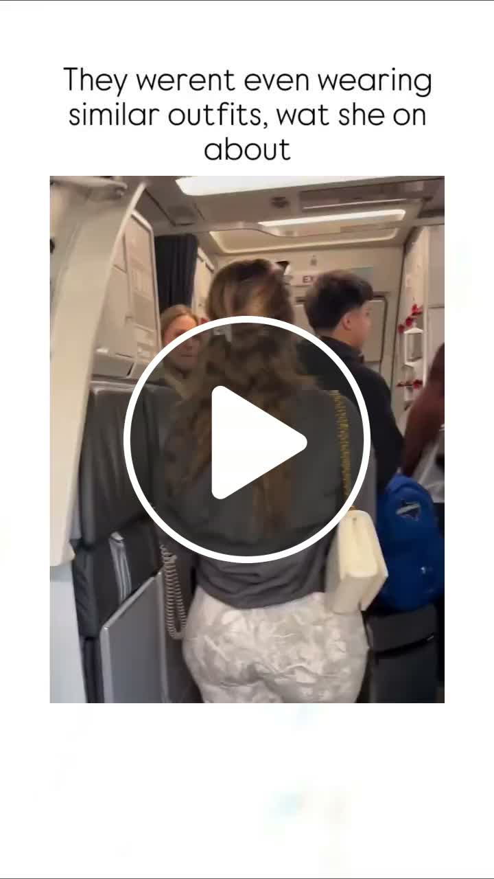 The video shows a flight attendant approaching a woman on a plane ...