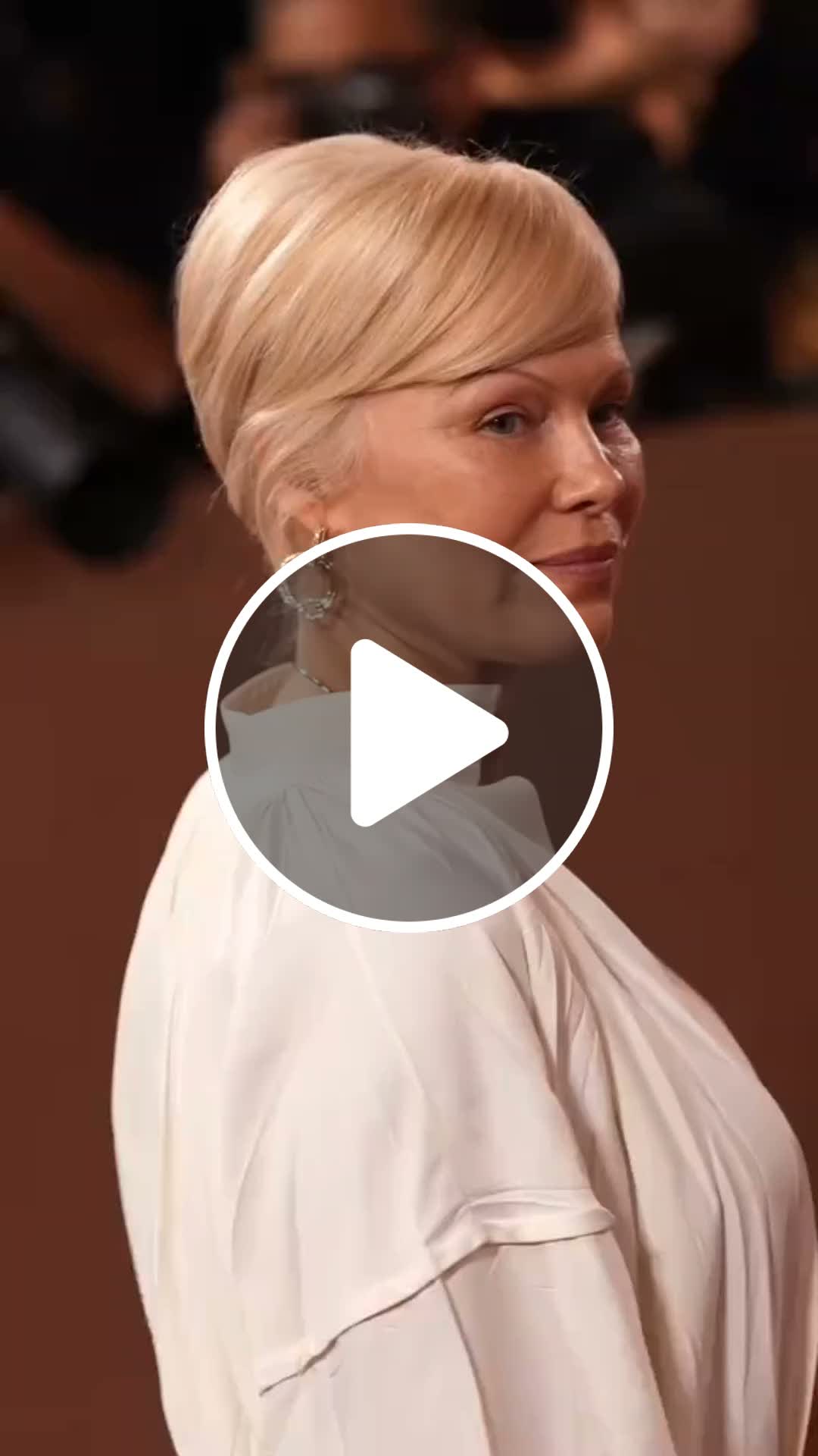 Pamela Anderson, a vision in white for The Golden Globes.# ...