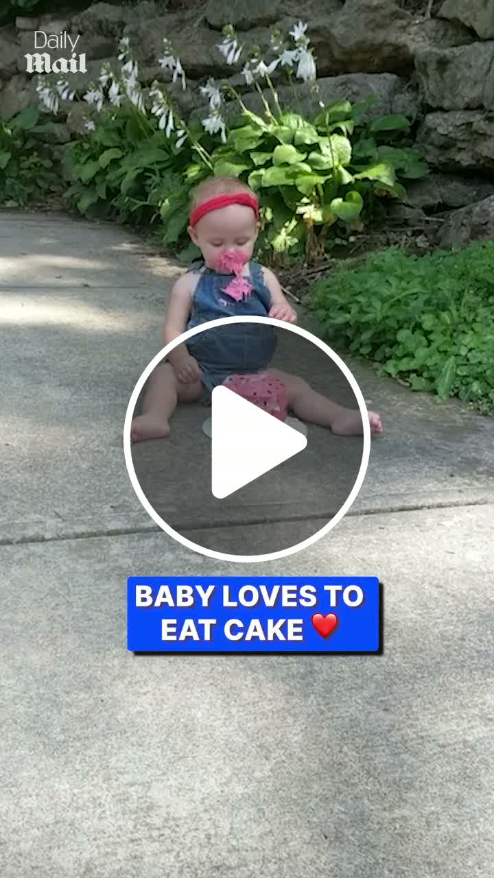 Toddler shoves face in cake - NewsBreak