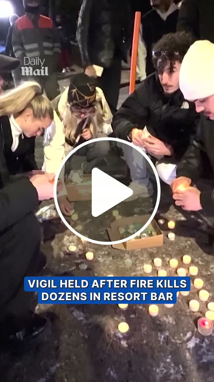 Vigil held for fire victims (1) - NewsBreak