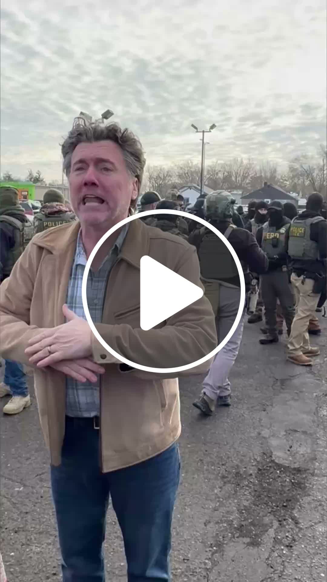 Watch tense standoff as dozens of ICE agents flood St. Cloud - NewsBreak